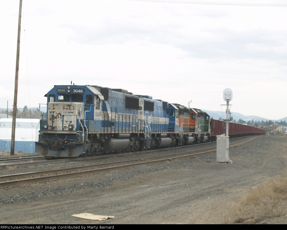 EMDX SD-60s 9046 and 9004 With Two BNSF SD-40s About to Head North
